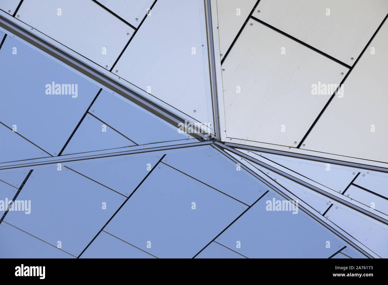 Close-up of junction of arrises of geometrically designed building with ...