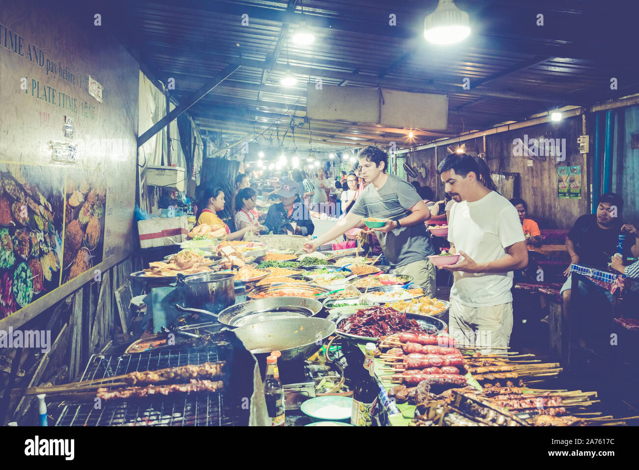 Food bazaar. Traditional buffet at local street food at Night Market at ...