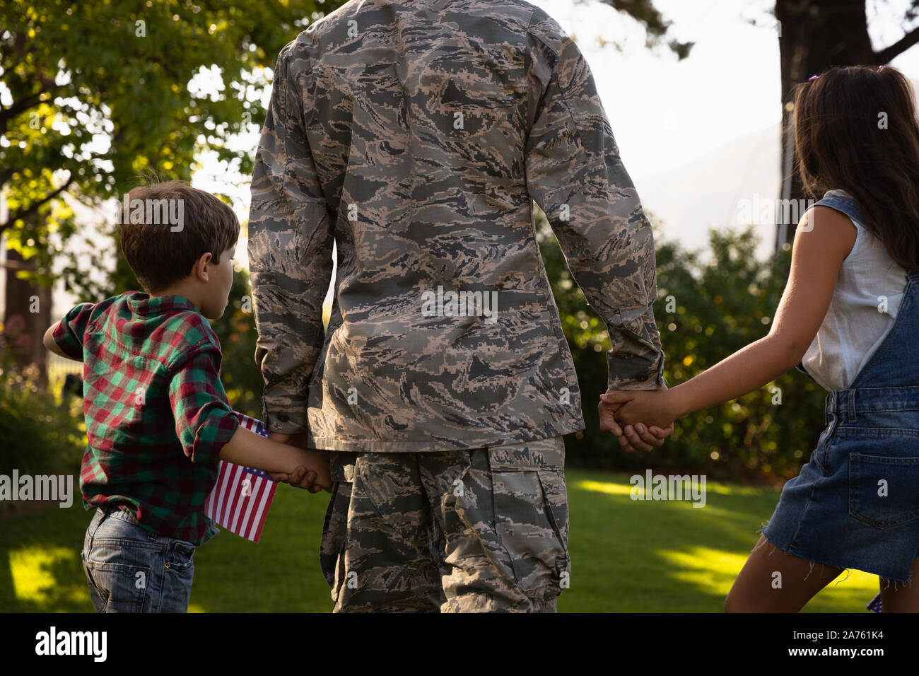 Soldier with kids Stock Photo - Alamy
