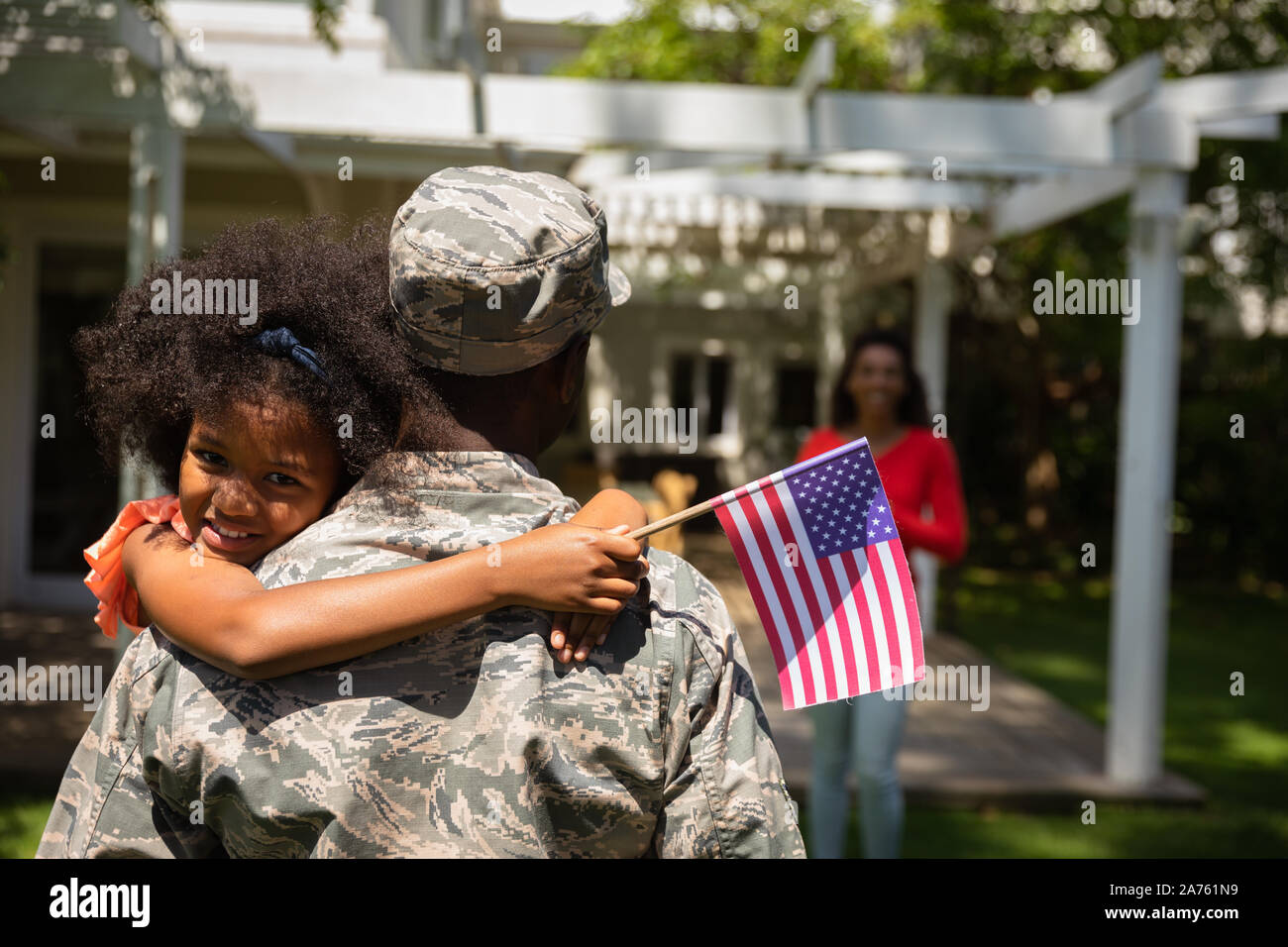 Soldier with daughter Stock Photo - Alamy