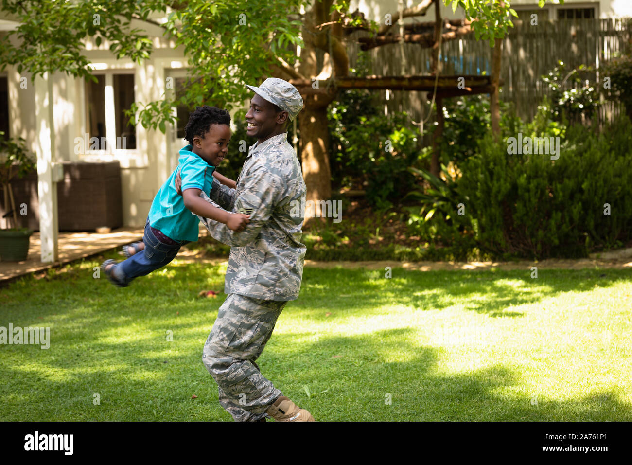 Soldier carrying child hi-res stock photography and images - Alamy