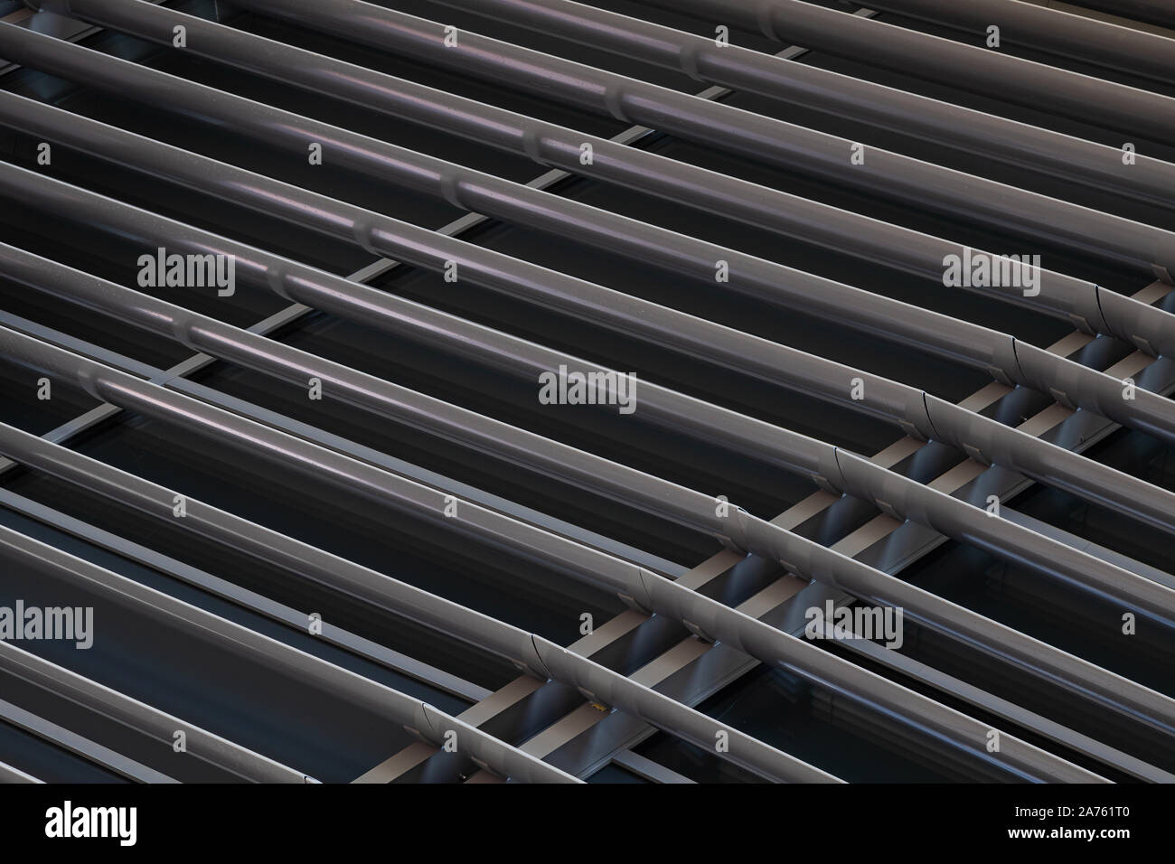 Angular view closeuup of dark metal beams structure in fragment of ...