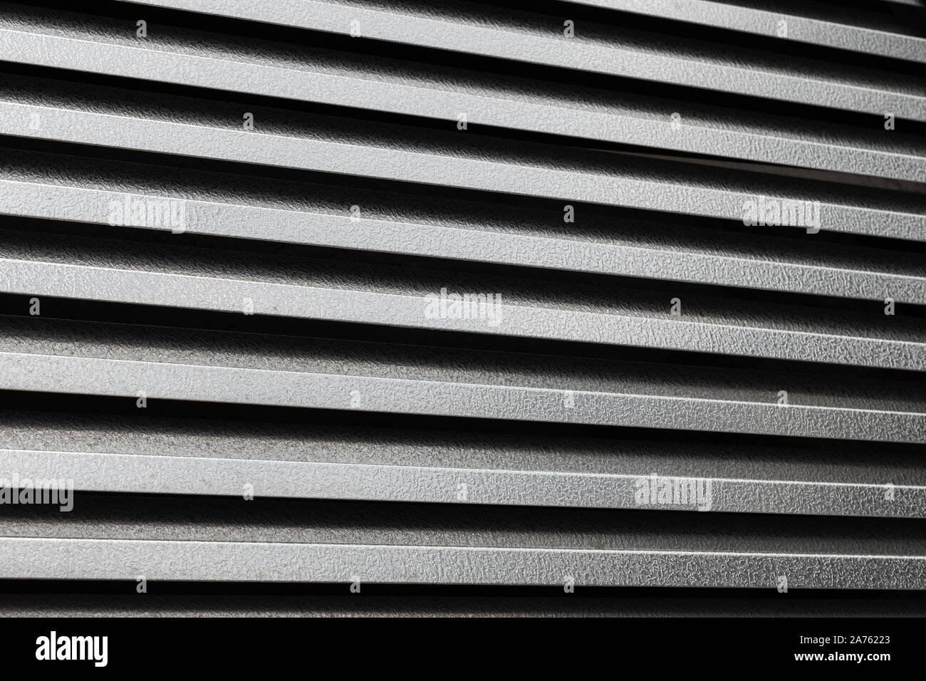Black horizontal corrugated metal surface or galvanized steel ...