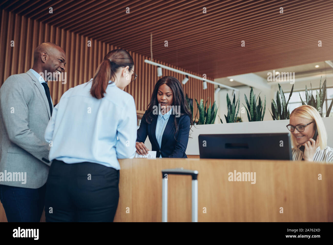 American hotel reception diversity hi-res stock photography and images ...