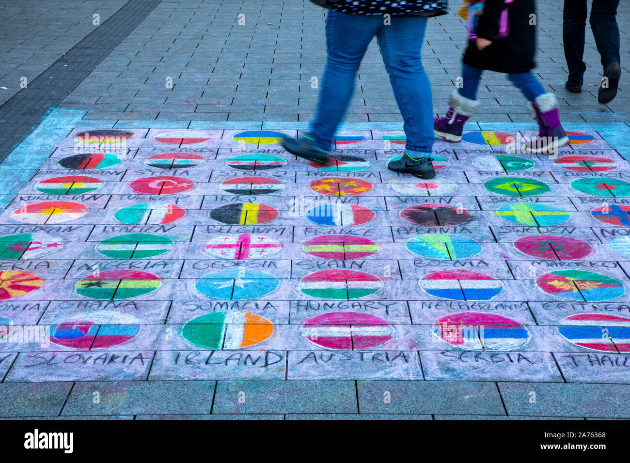Street painting, national colours and national flags of many countries ...