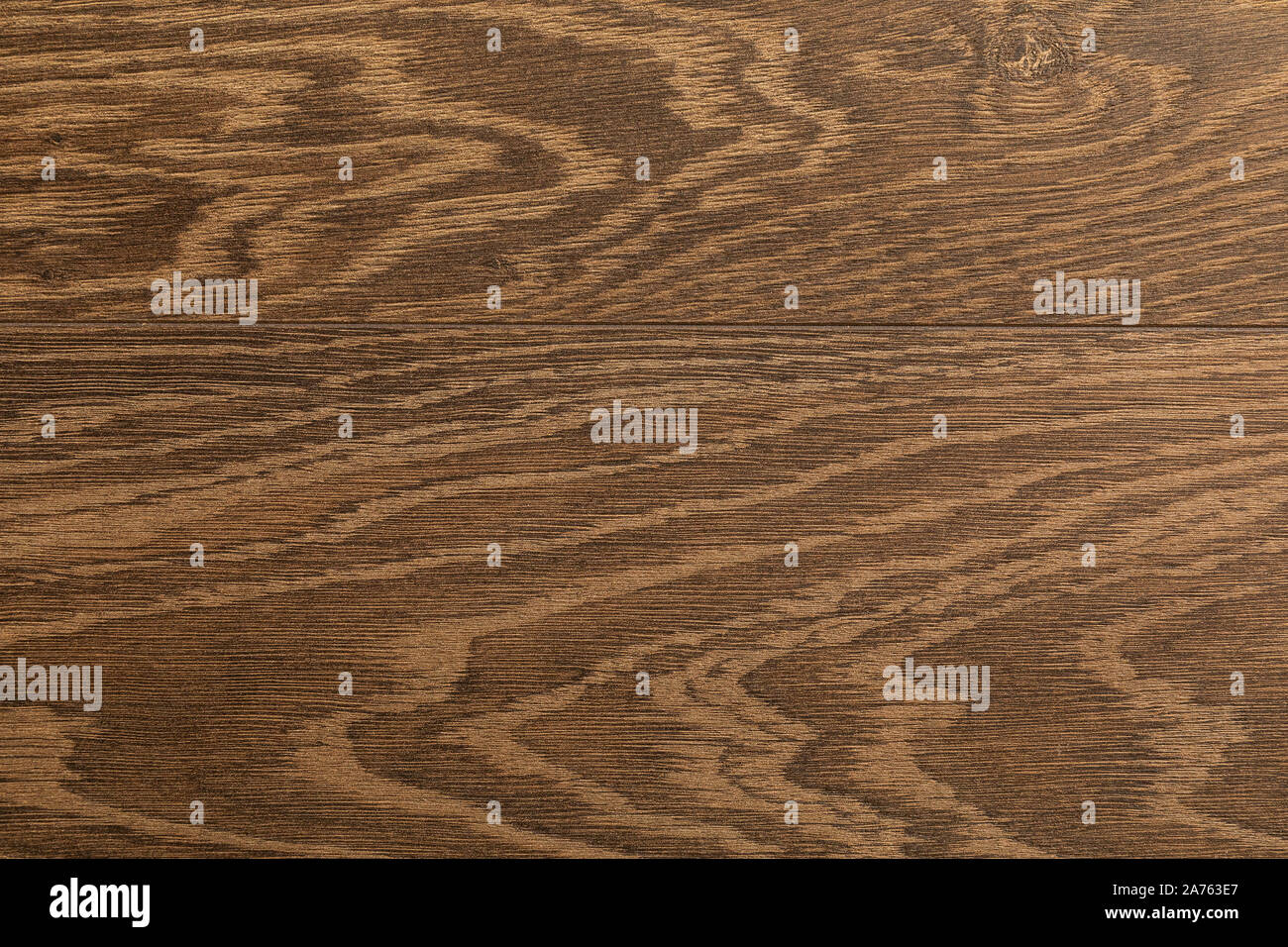 Close-up of dark chestnut laminate floor coating Stock Photo - Alamy