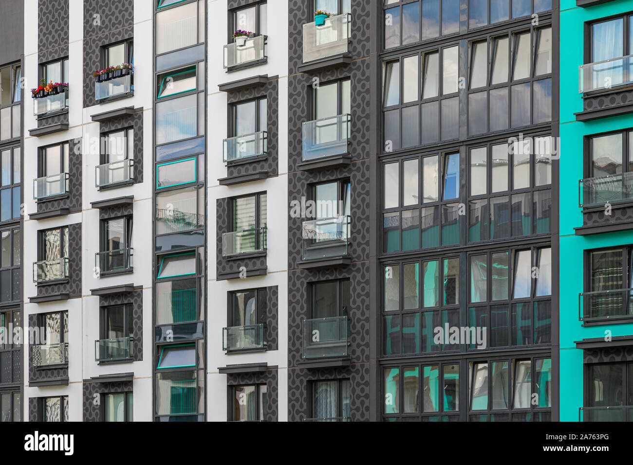 Angular view of new modern apartment building wall Stock Photo - Alamy