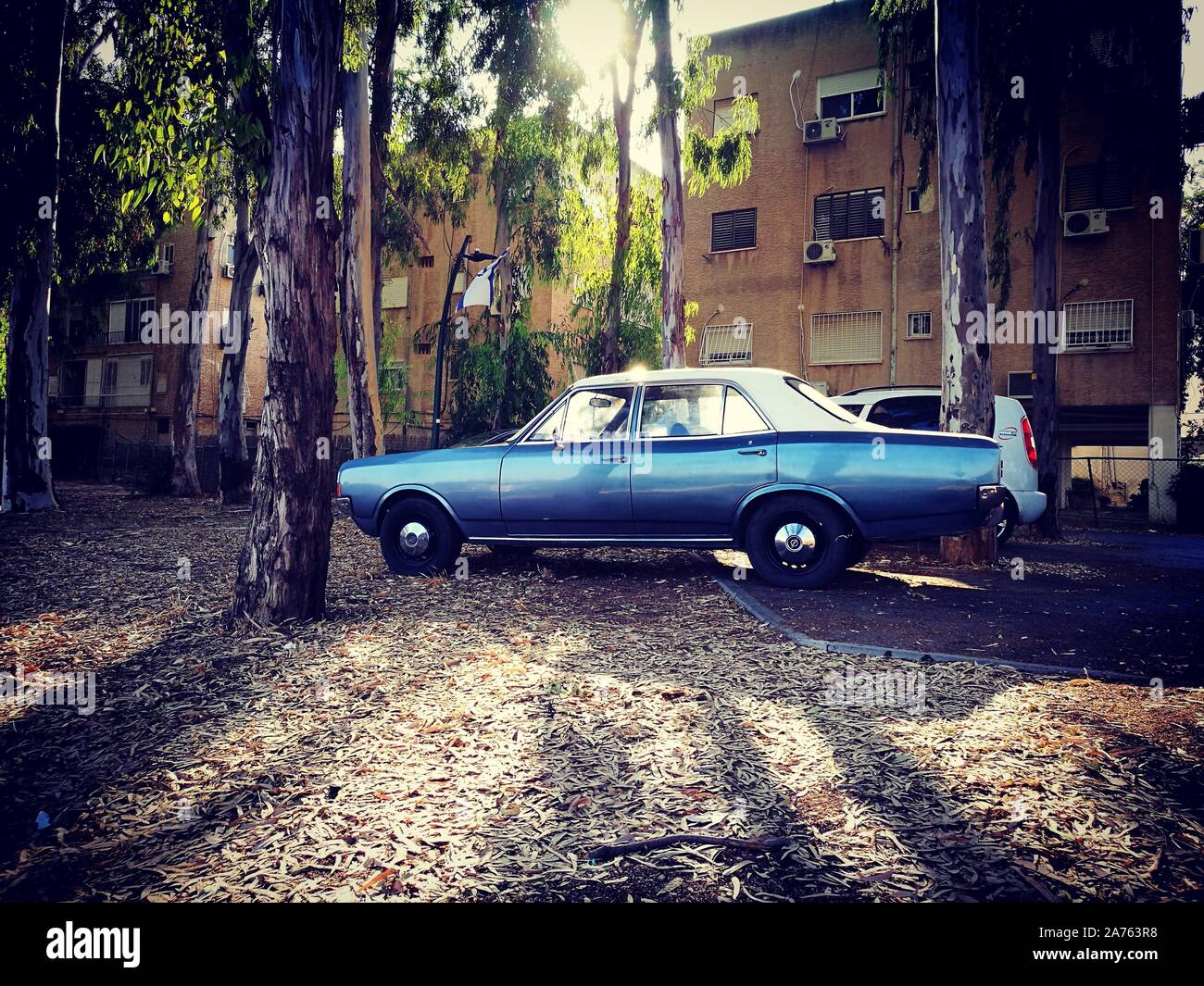 beautiful classic car parked in the shade Stock Photo - Alamy