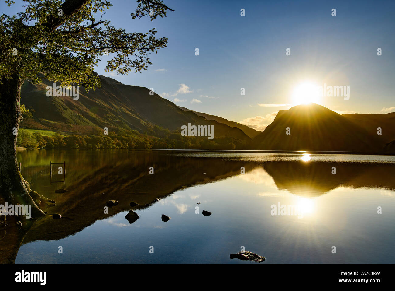 Buttermere with the early October sun rising above Fleetwith Pike Stock ...
