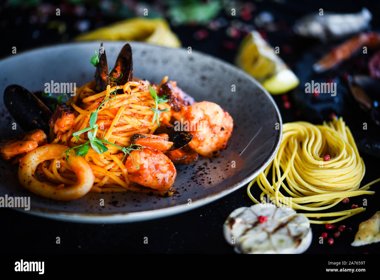 delicious italian spaghetti with fresh seafood & tasty vegetables Stock ...