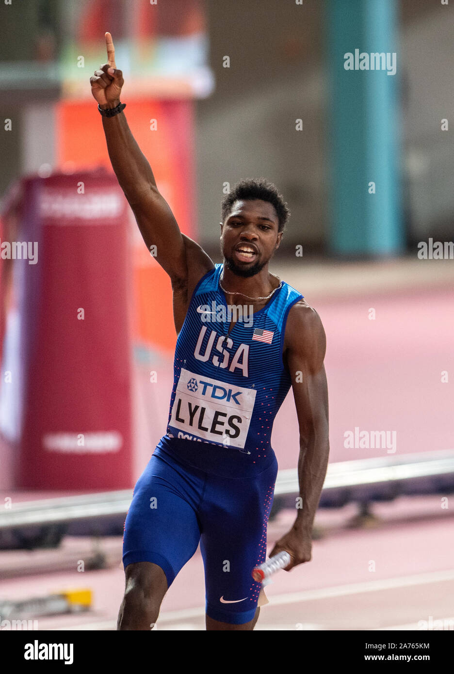 DOHA - QATAR OCT 5: Noah Lyles of the USA crossing the finishing line ...