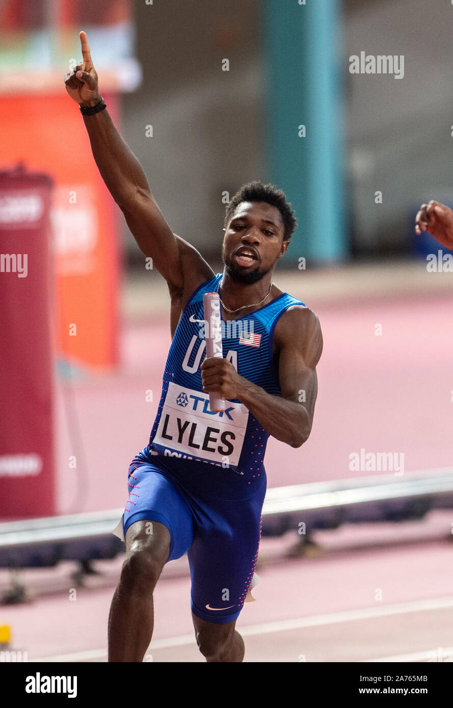 DOHA - QATAR OCT 5: Noah Lyles of the USA crossing the finishing line ...