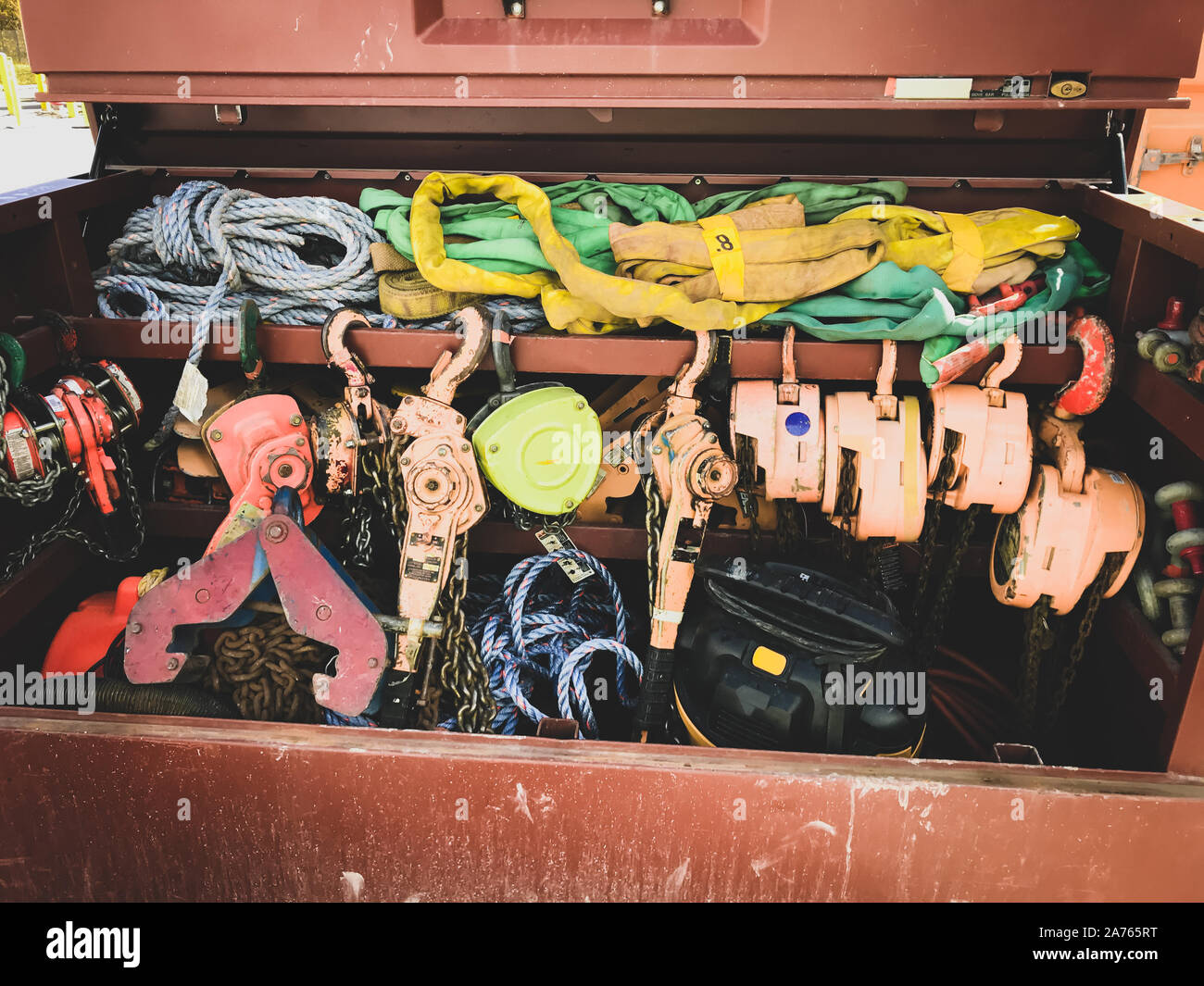Storage steel box with ropes and chains for cranes Stock Photo - Alamy