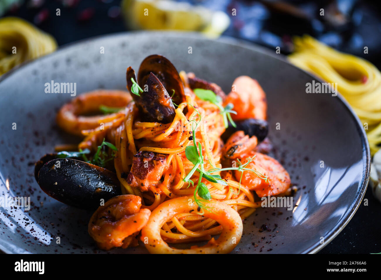 delicious italian spaghetti with fresh seafood & tasty vegetables Stock ...