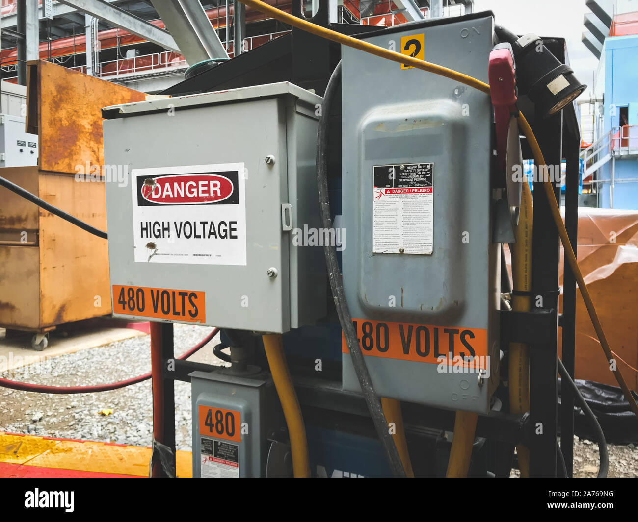 High voltage panel on the field with danger sign Stock Photo - Alamy