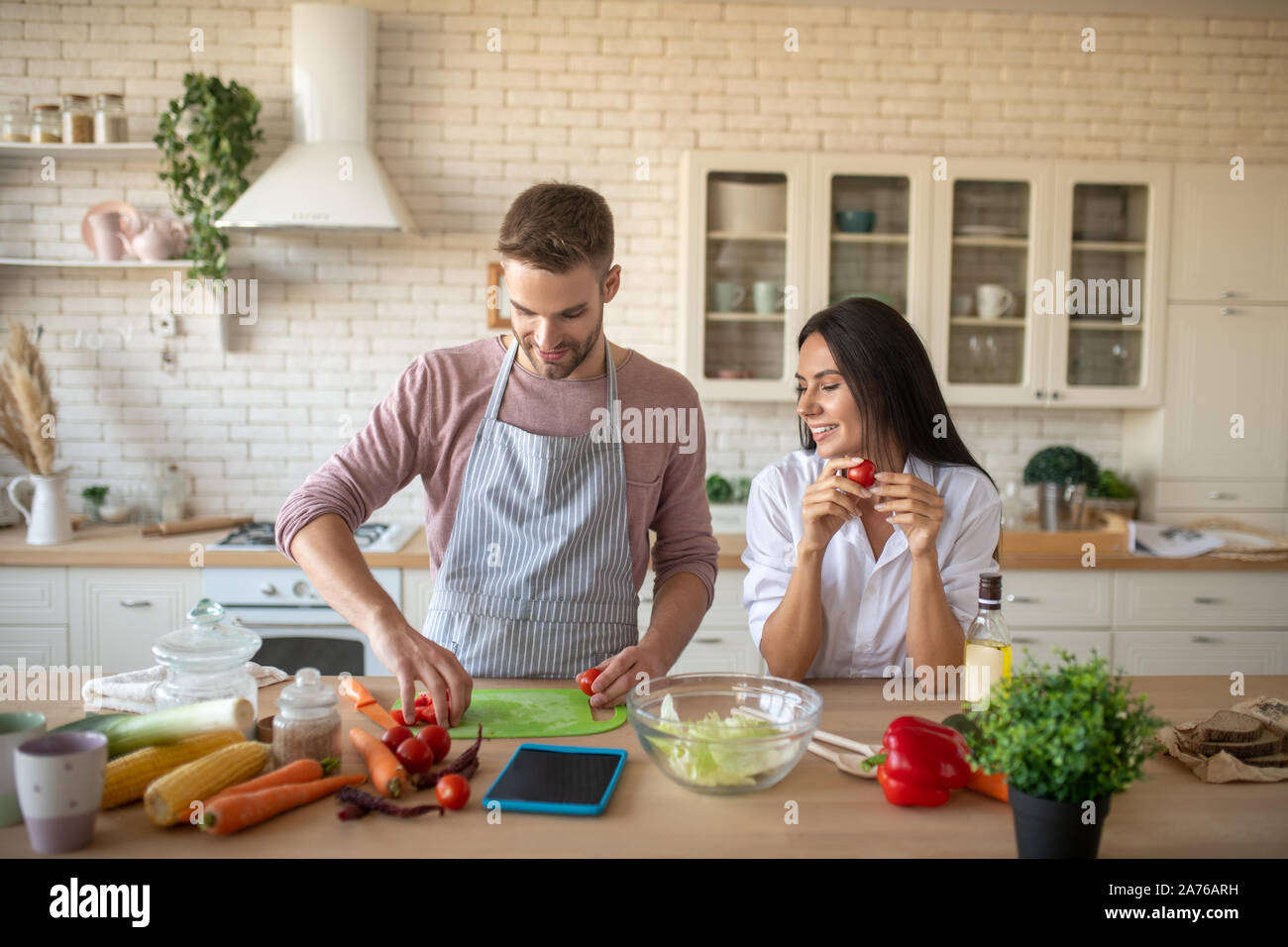 Husband, cooking apron hi-res stock photography and images - Alamy