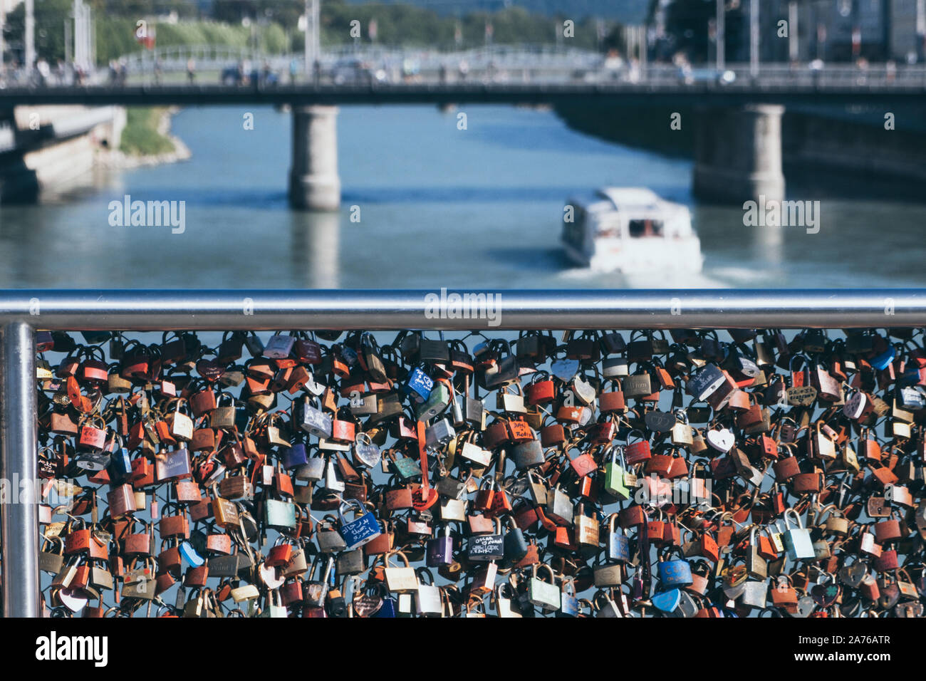 Famous European bridge with love locks attached with great view of the ...
