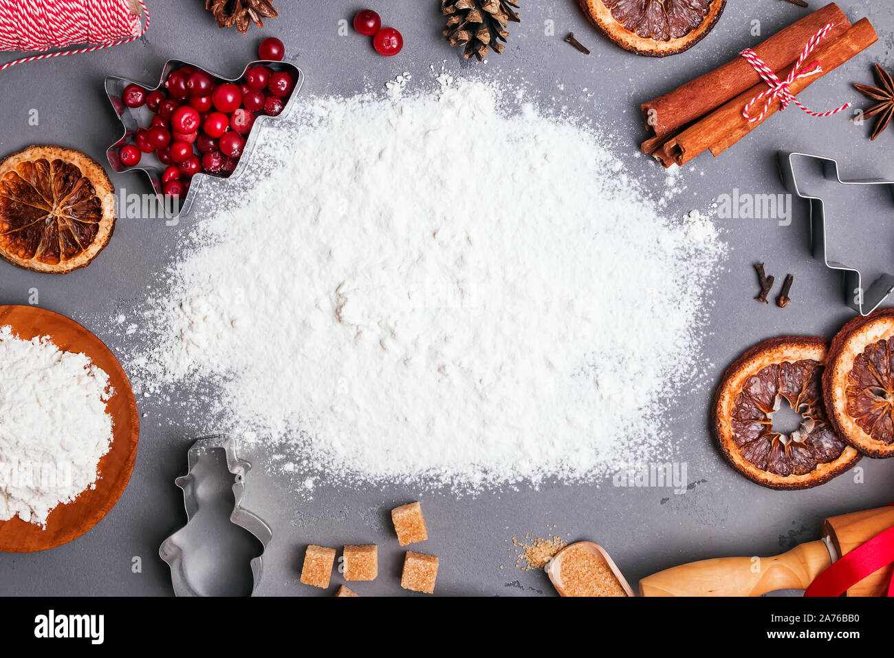Traditional Christmas spices and ingredients for baking arranged into ...