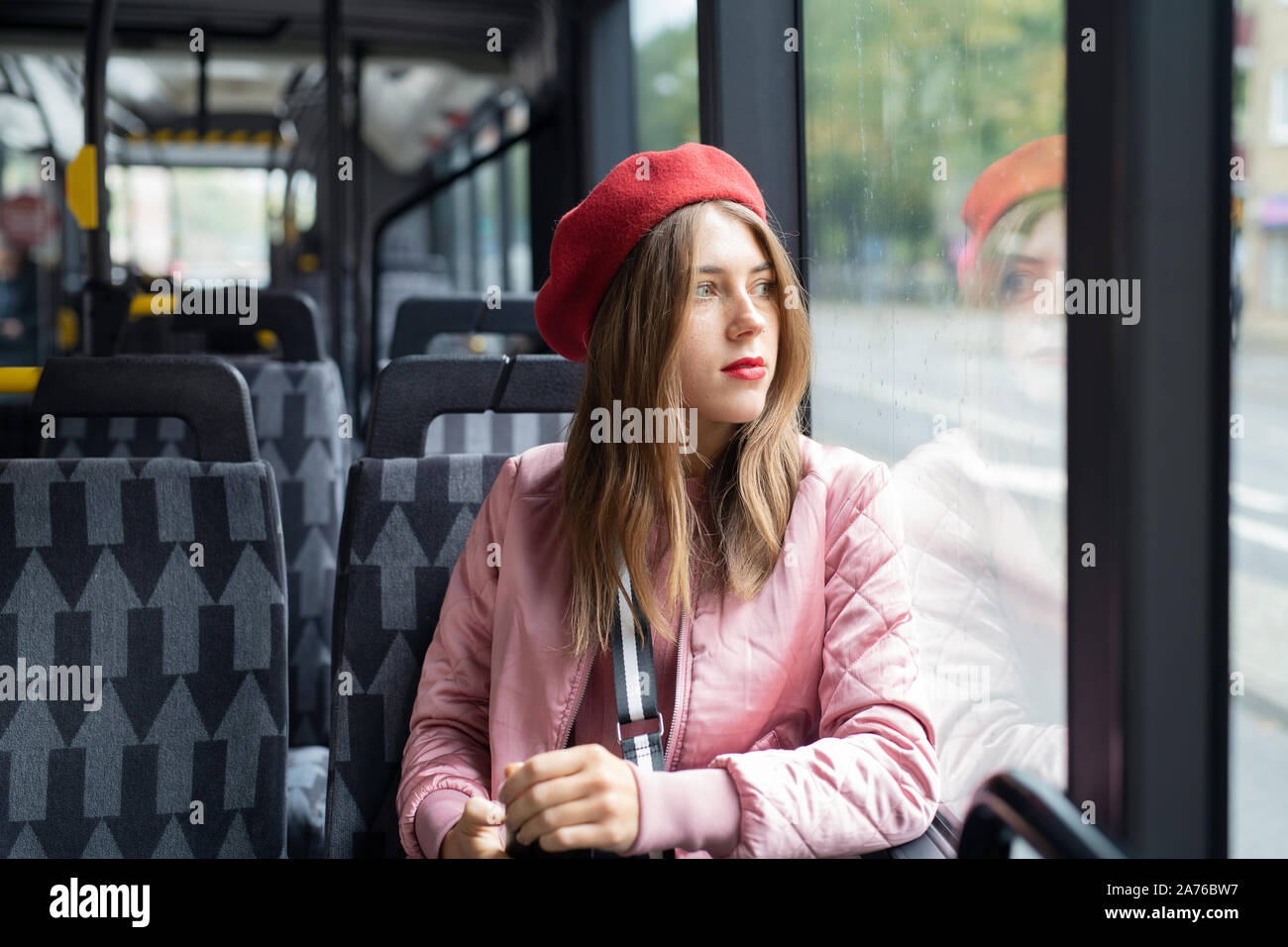 Woman riding bus hi-res stock photography and images - Alamy