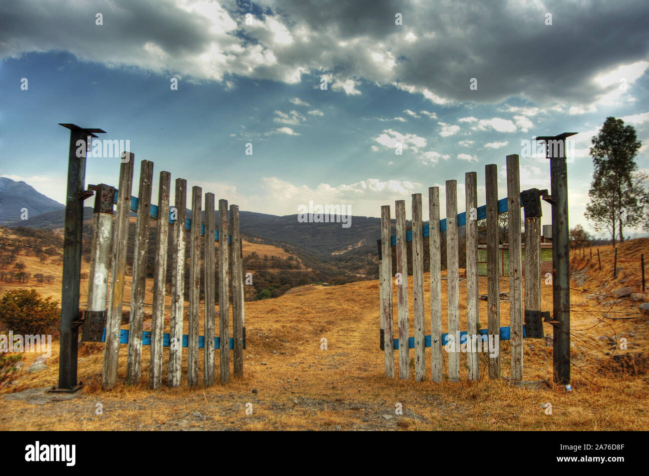 Old Open Wooden Rural Gate and Landscape Stock Photo - Alamy