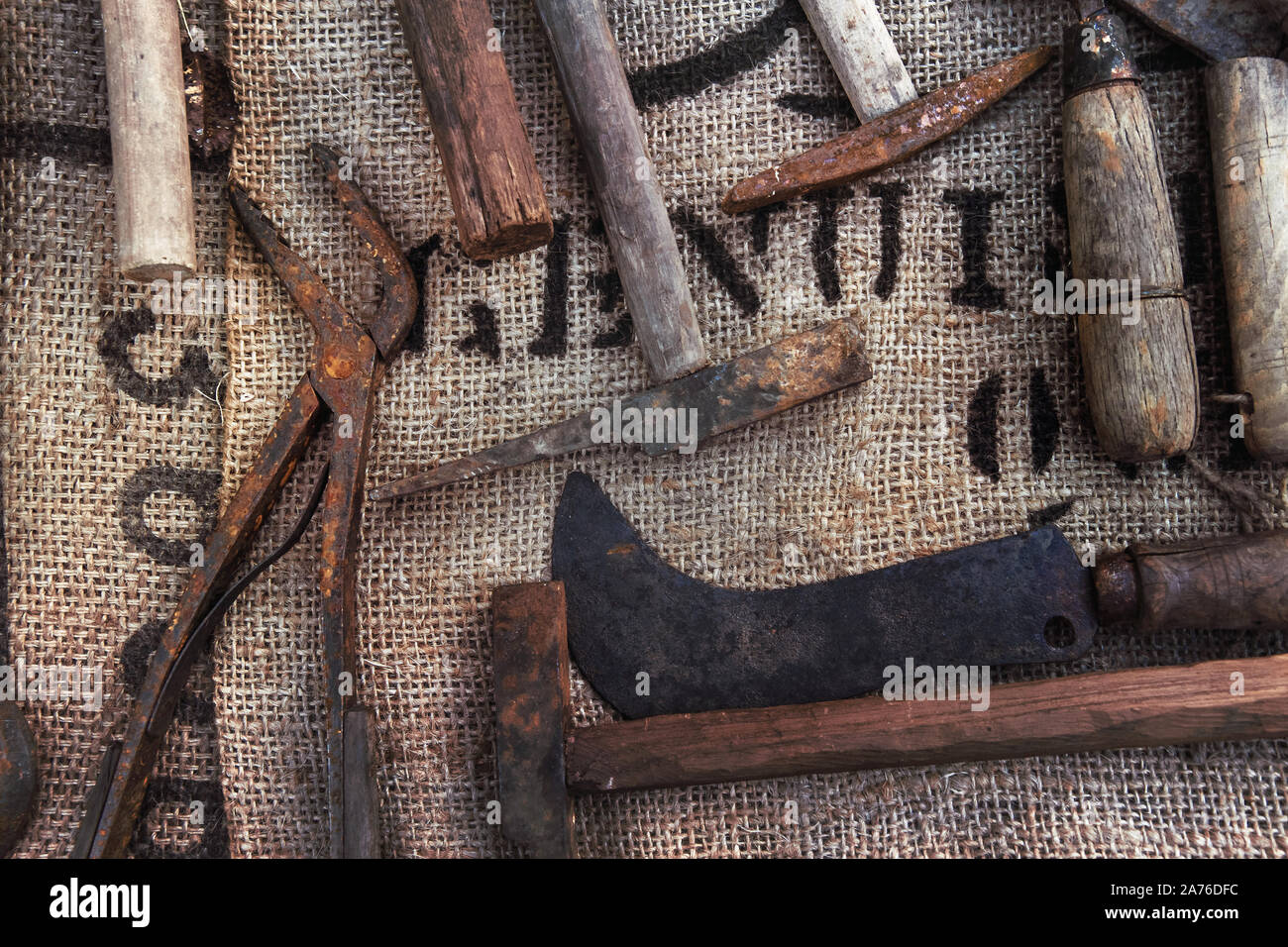 old craftsman tools background, vintage set of a farmer implements on a ...