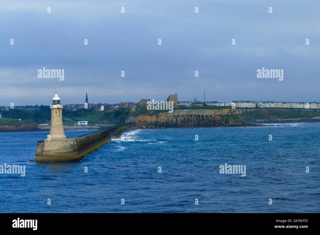 Tynemouth lighthouse in Great Britain, port entrance to Newcastle, with ...