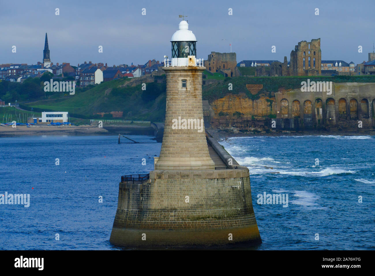 Tynemouth lighthouse in Great Britain, port entrance to Newcastle, with ...