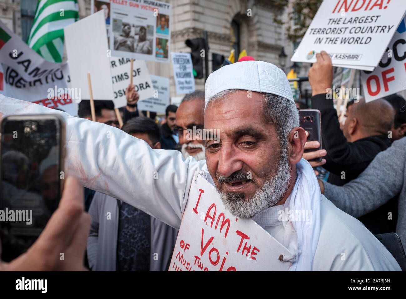 London, UK, 27th Oct 2019. Protestors express their anger by kicking ...