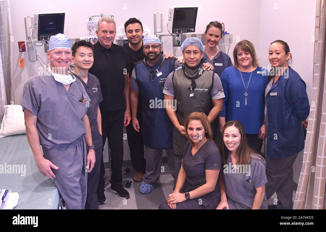 Hall of Fame quarterback Joe Montana poses with the Trinity Center ...