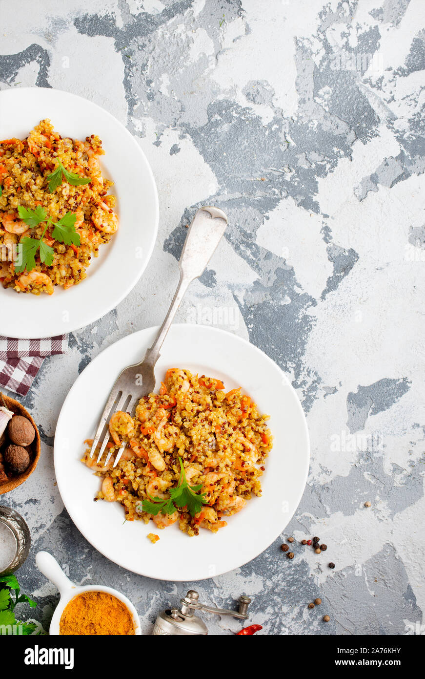 boiled bulgur with sauce and fried shrimps Stock Photo - Alamy