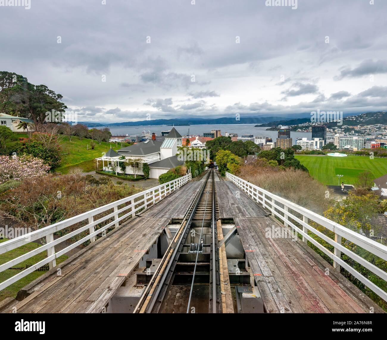 View of Wellington Harbour Bay with tracks of the historic rack railway ...