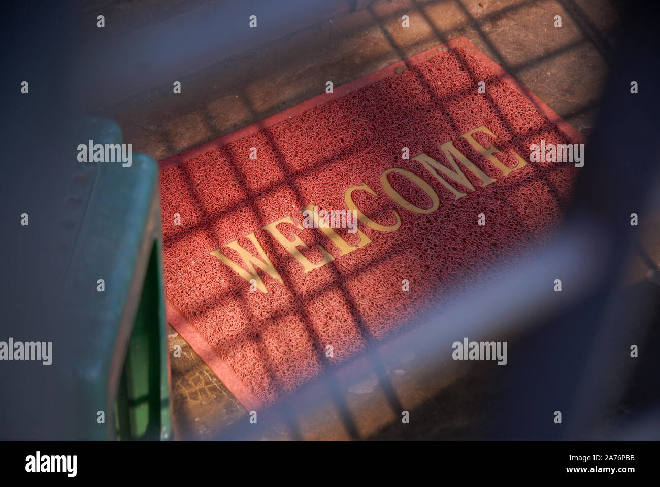 Welcome mat in front of door, Yangon, Myanmar, Asia Stock Photo - Alamy