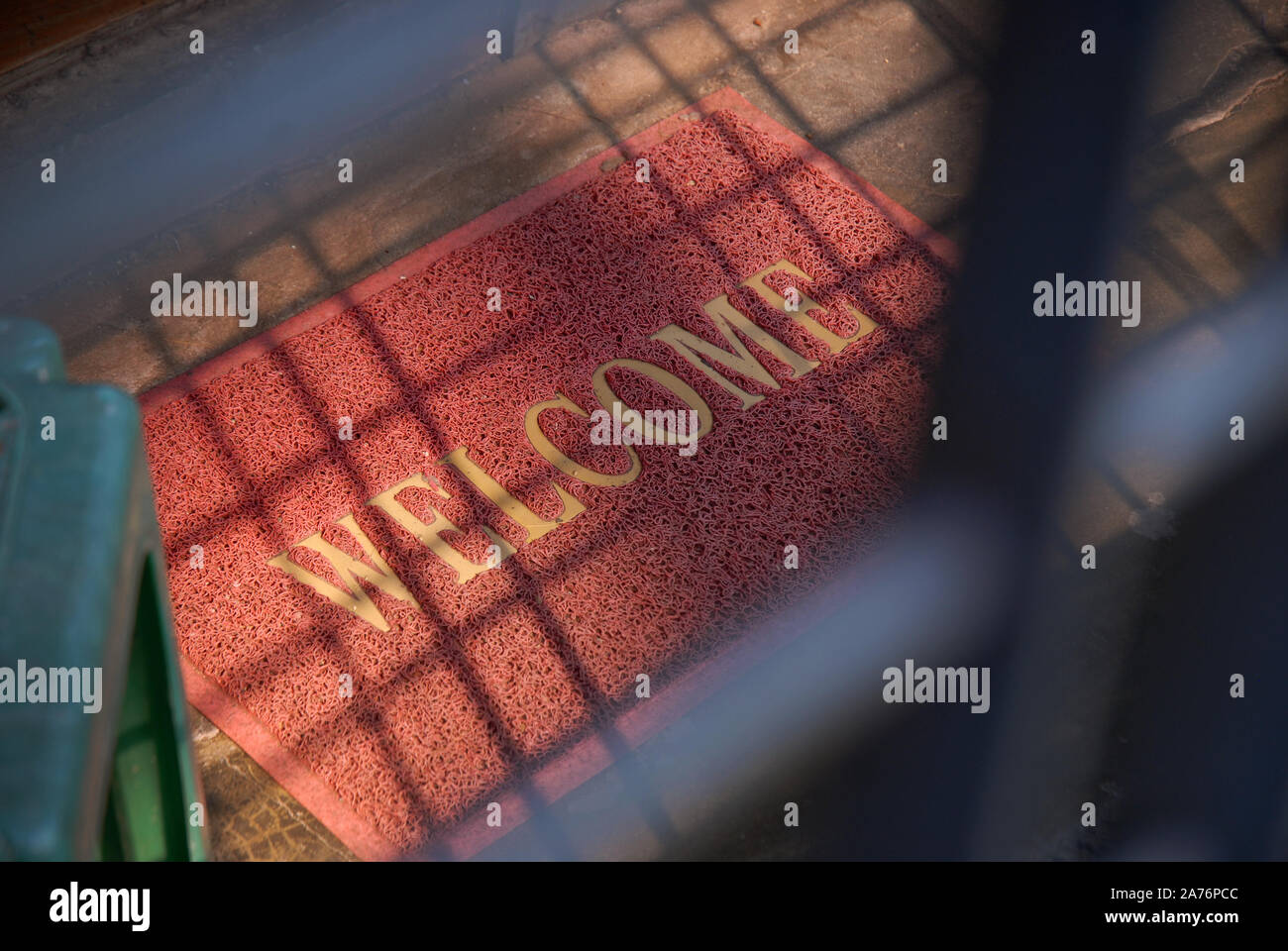 Welcome mat in front of door, Yangon, Myanmar, Asia Stock Photo - Alamy