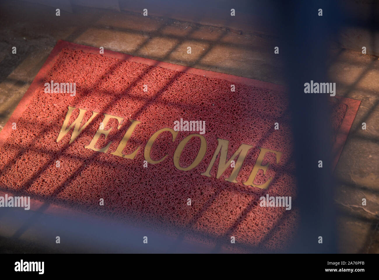 Welcome mat in front of door, Yangon, Myanmar, Asia Stock Photo - Alamy