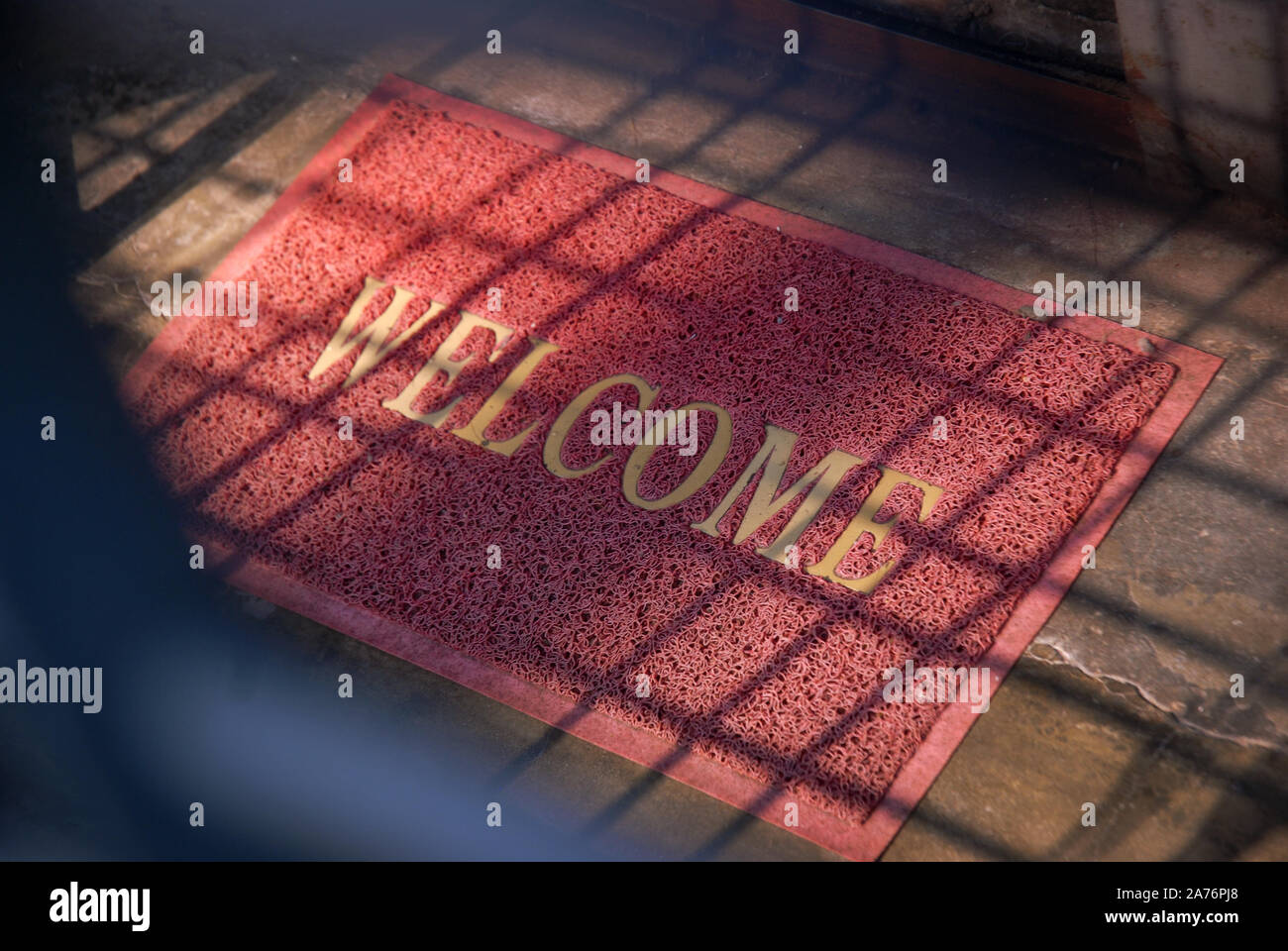 Welcome mat in front of door, Yangon, Myanmar, Asia Stock Photo - Alamy