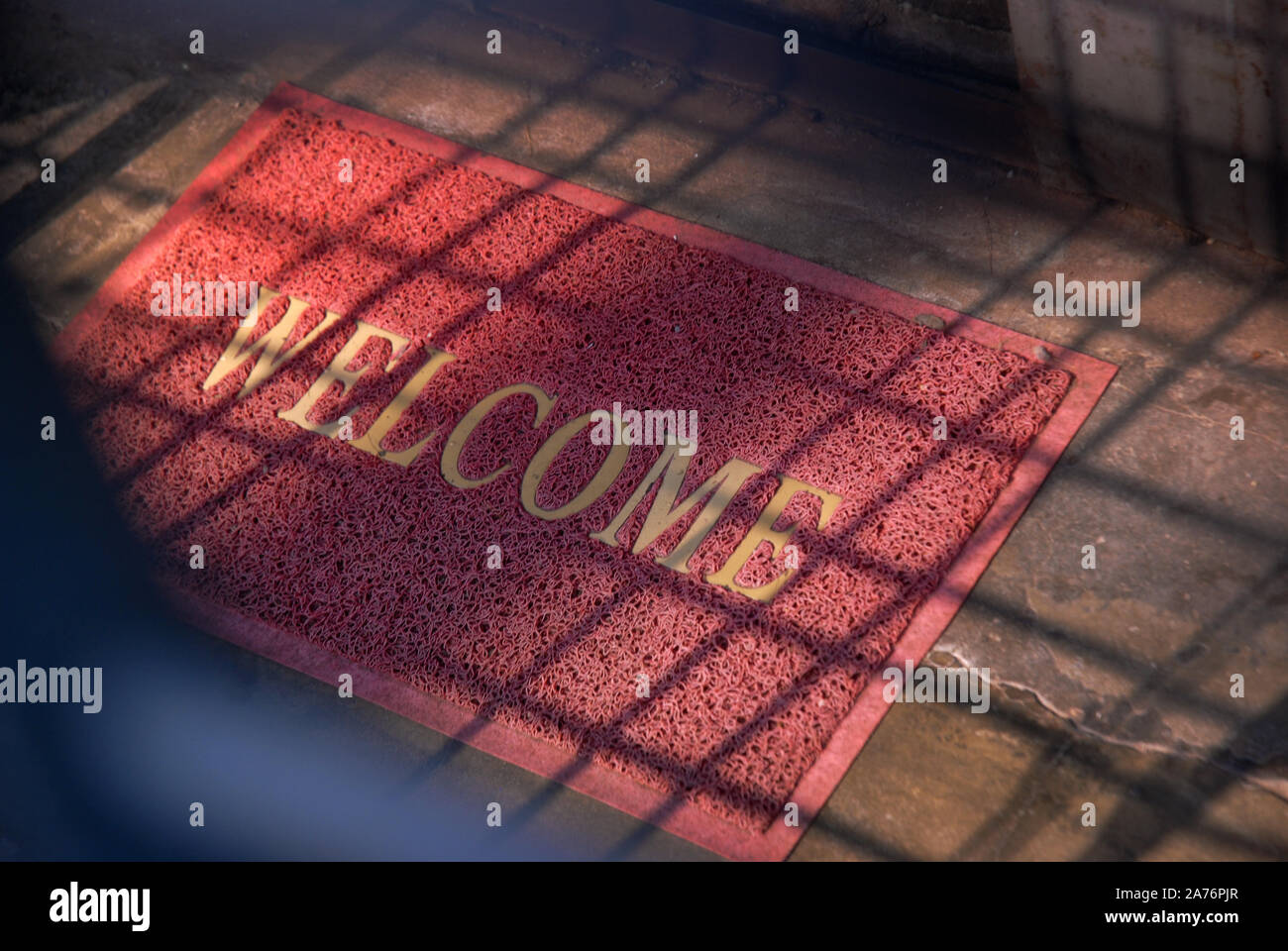 Welcome mat in front of door, Yangon, Myanmar, Asia Stock Photo - Alamy