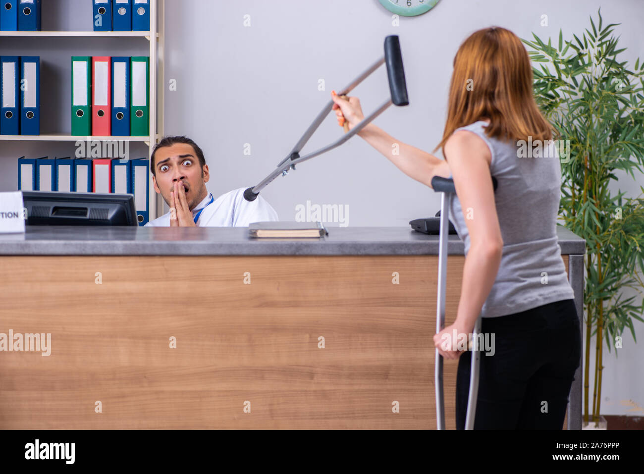 Hospital reception angry hi-res stock photography and images - Alamy