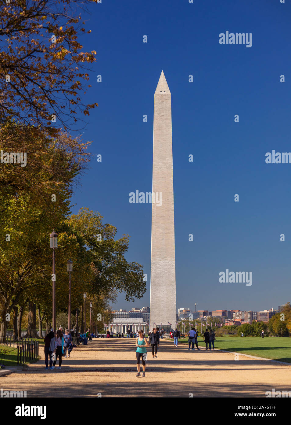 WASHINGTON, DC, USA - Washington Monument and people walking on ...