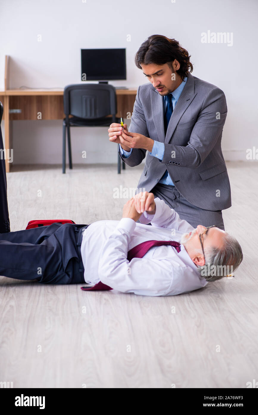 Businessman heart attack aid hi-res stock photography and images - Alamy