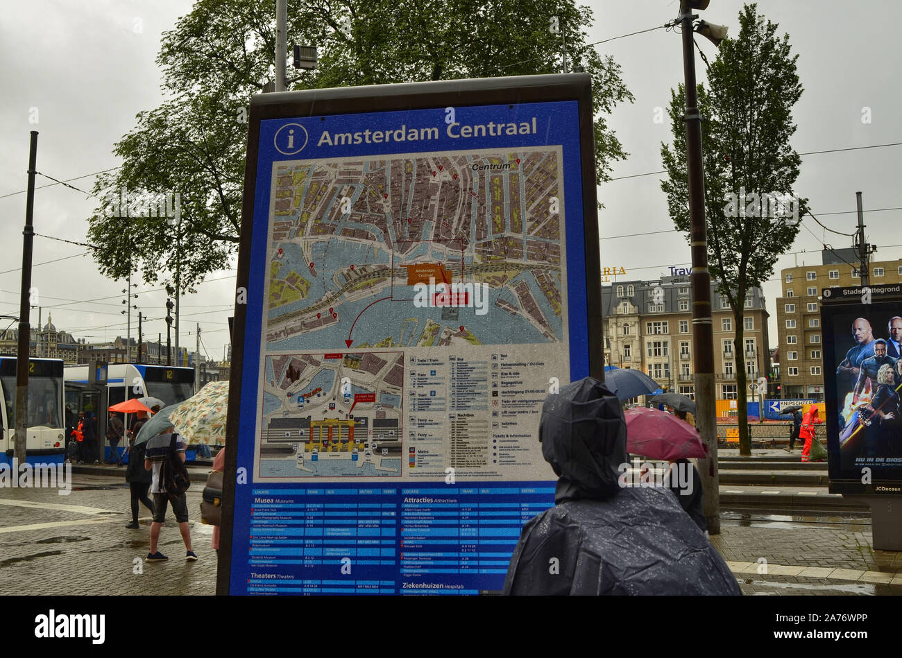 Amsterdam, Holland, August 2019. Leaving the train station, information ...