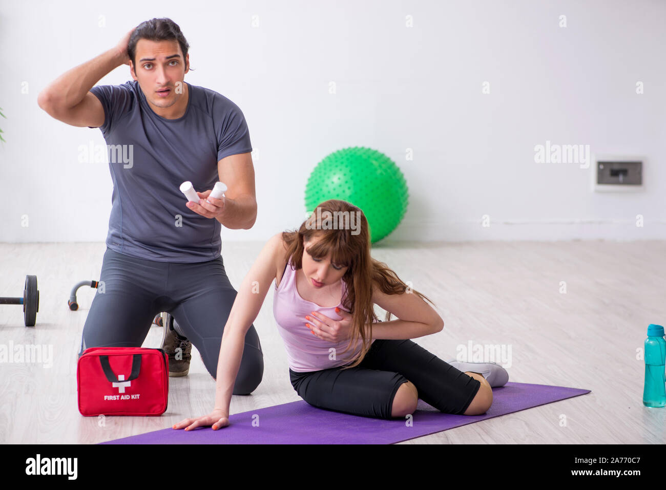 The young woman feeling bad during training in first aid concept Stock ...