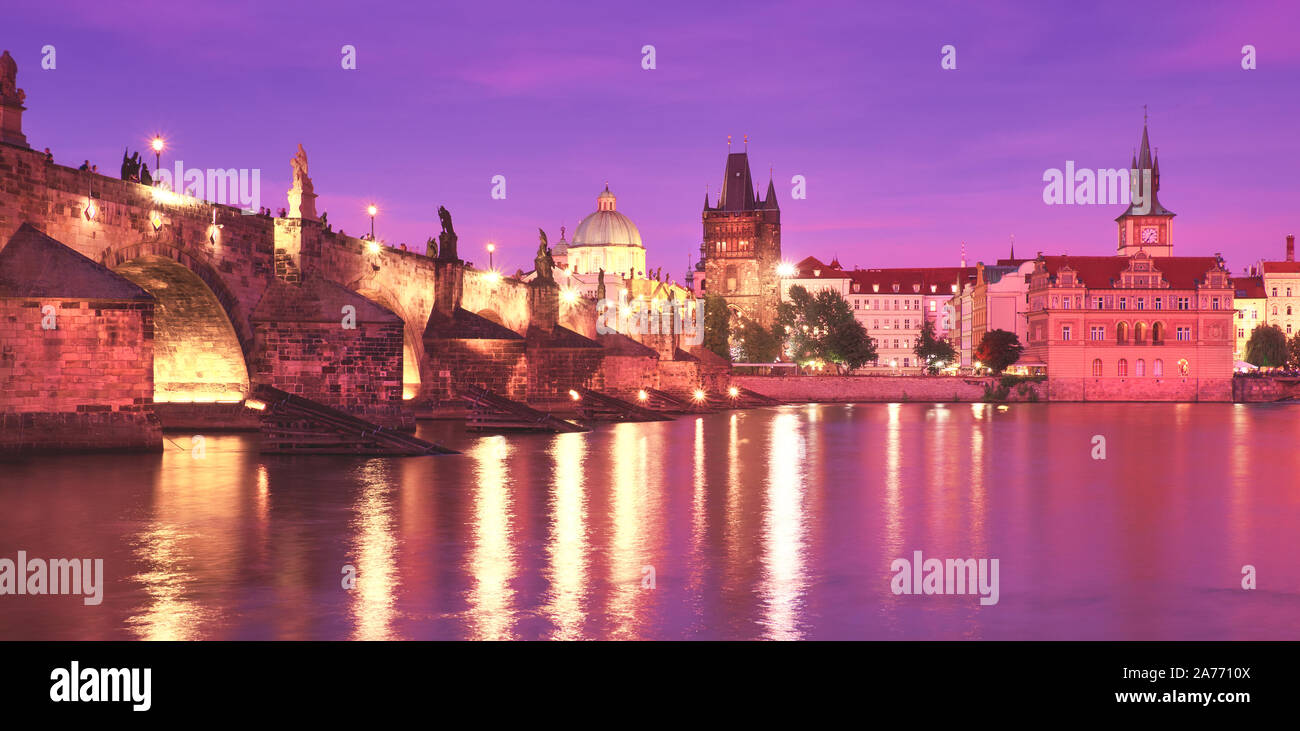 Prague on sunset, panoramic image. Illuminated Charles bridge, Bridge ...