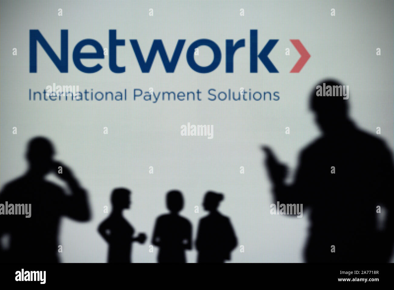 The Network International logo is seen on an LED screen in the ...