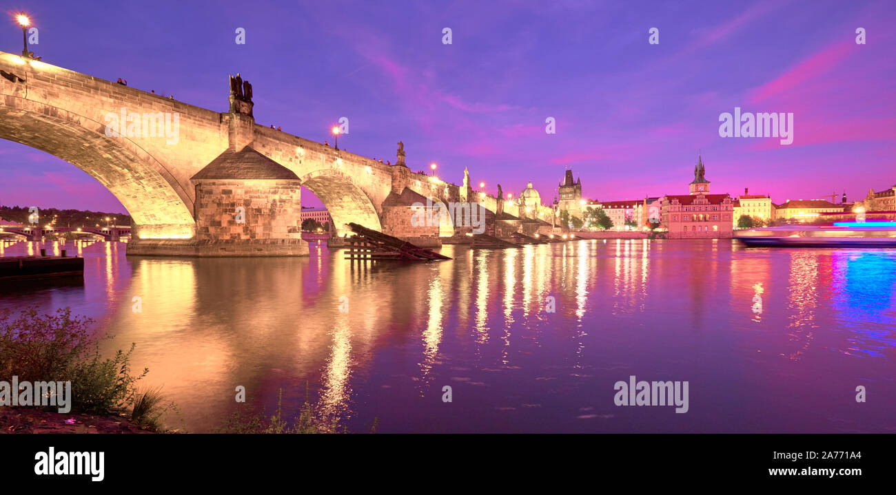 Prague at night, panoramic image. Illuminated Charles bridge, Bridge ...
