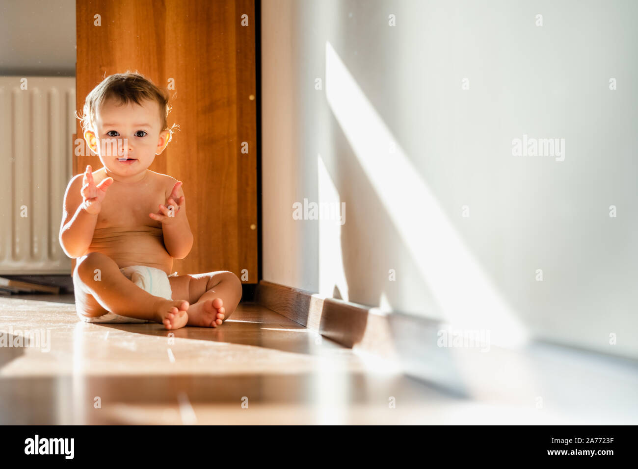 Baby girl clapping hands hi-res stock photography and images - Alamy