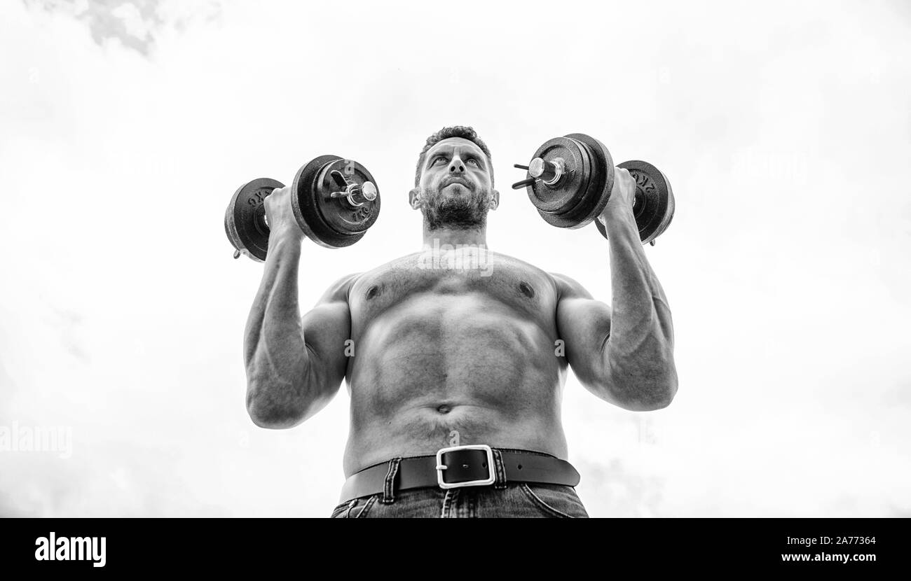 Sportsman with strong torso. Sport equipment. Fitness and bodybuilding ...