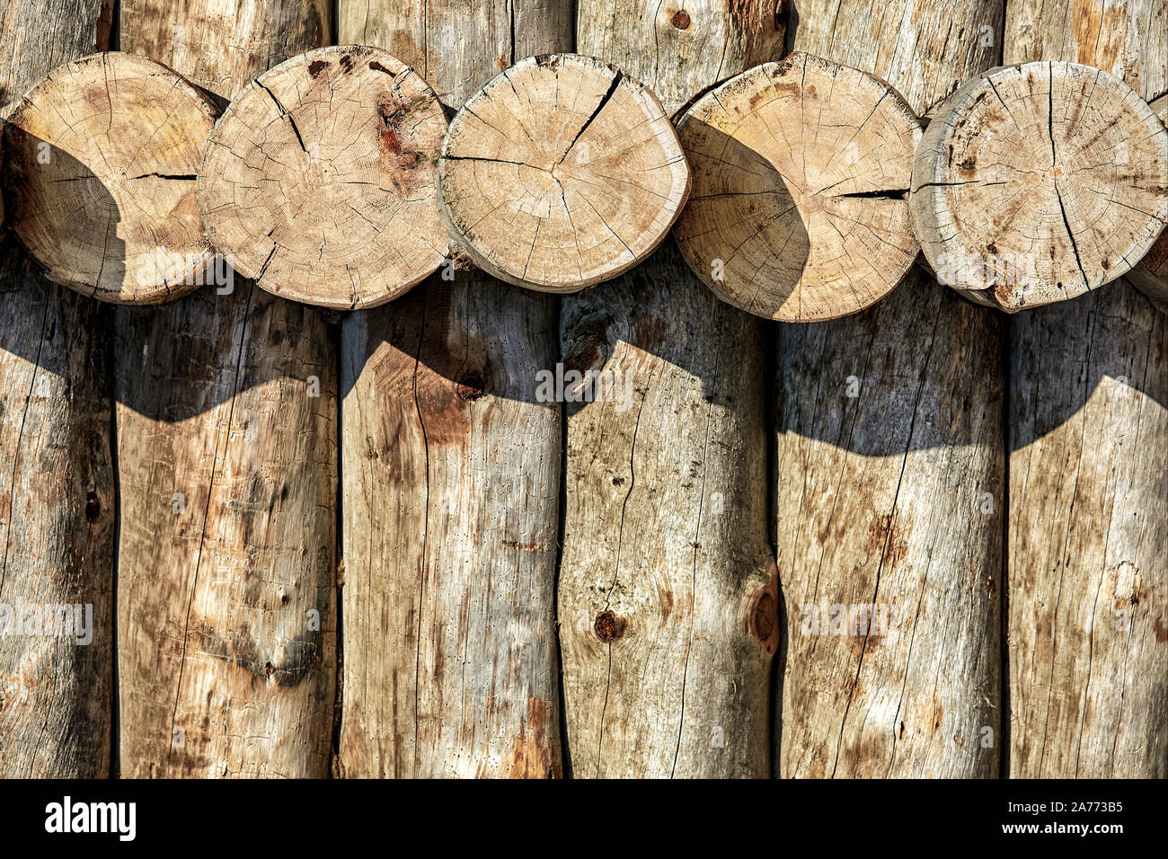 texture of logs, masonry coupling of wooden logs with cuts. Copy Space ...