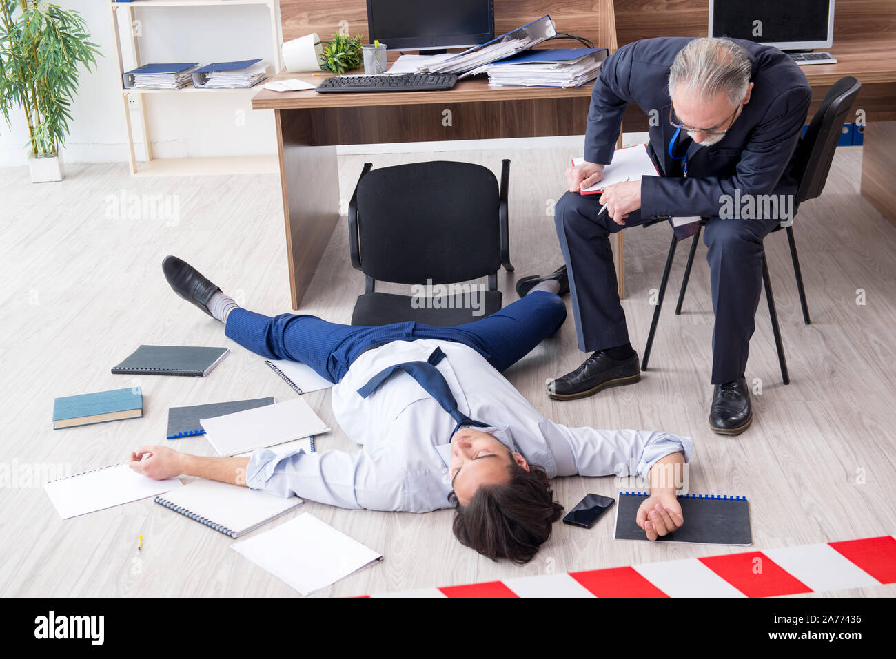 The forensic investigator and dead employee in the office Stock Photo ...