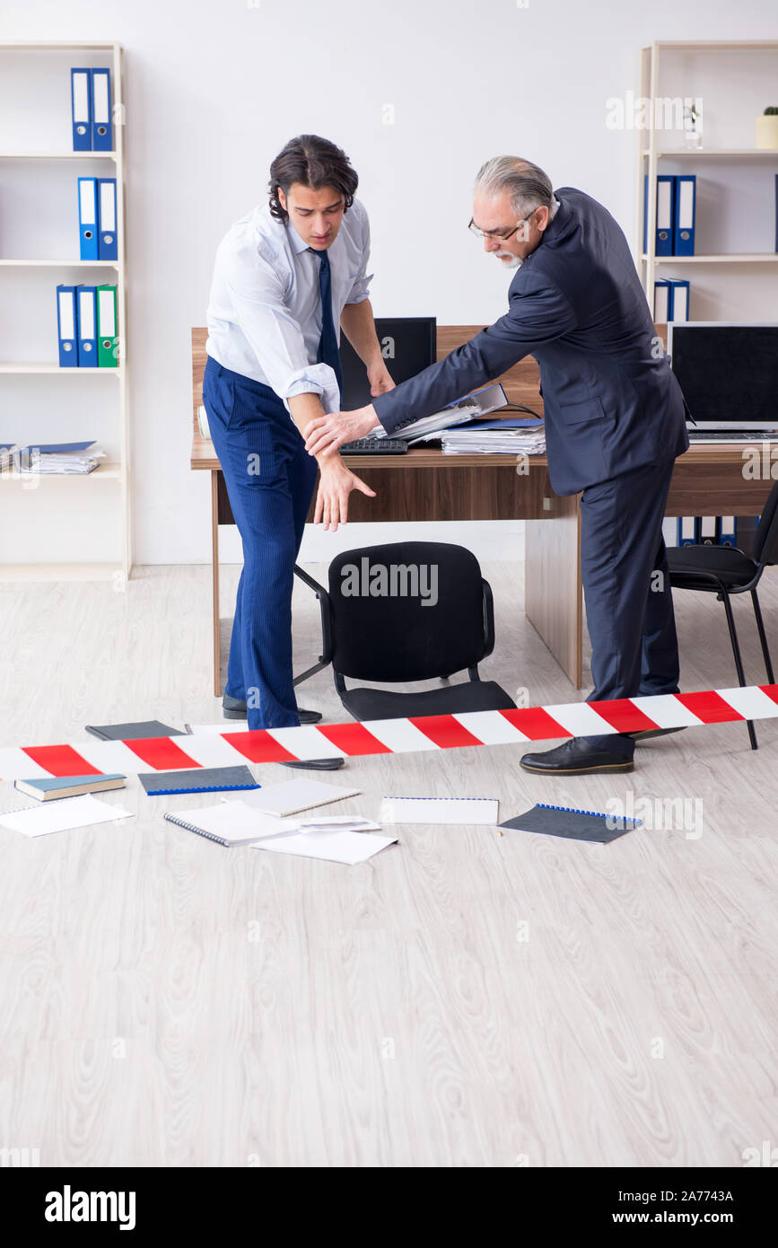 Detective investigating crime in office hi-res stock photography and ...