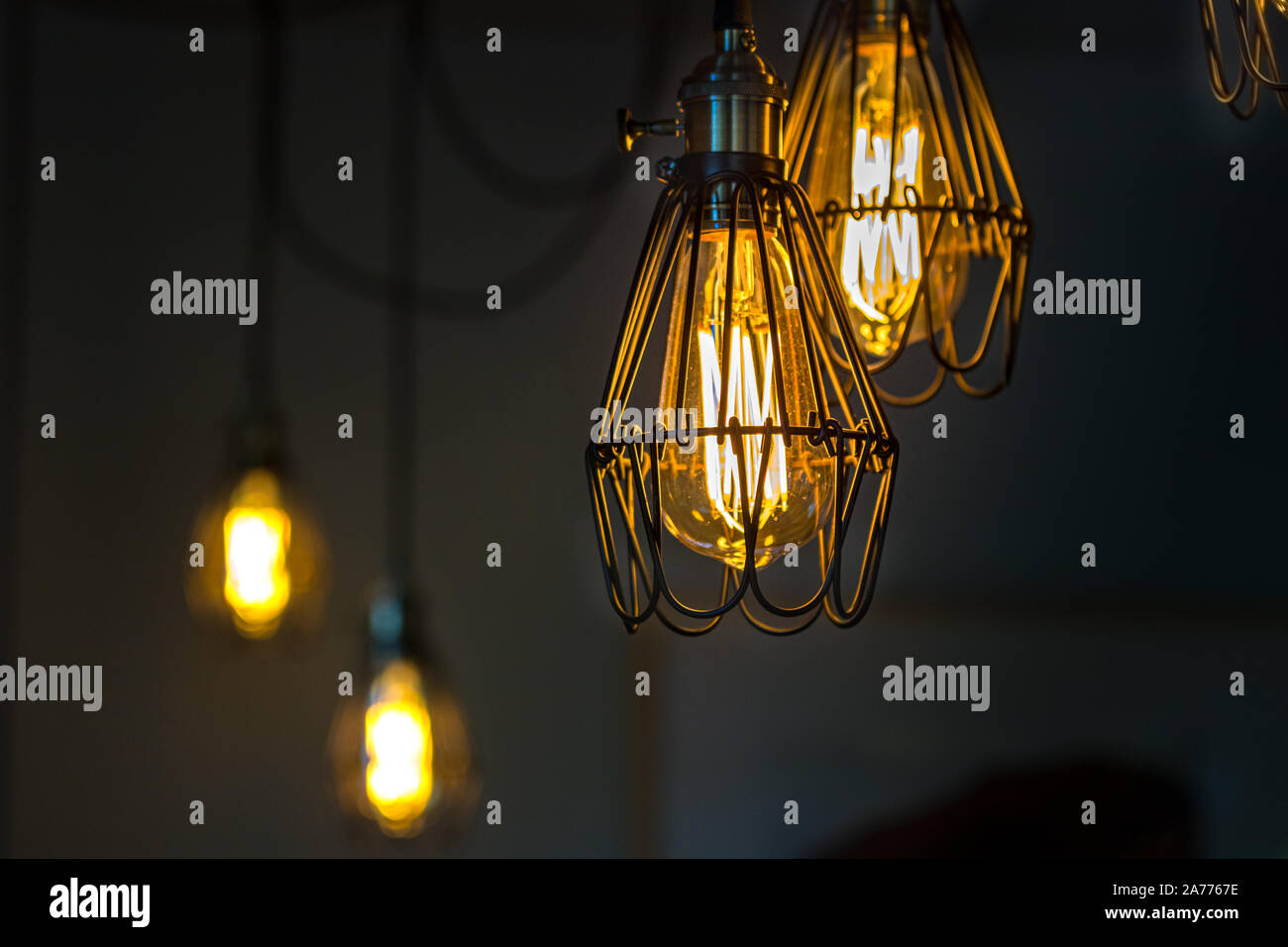 Vintage led filament light bulbs hanging Stock Photo - Alamy